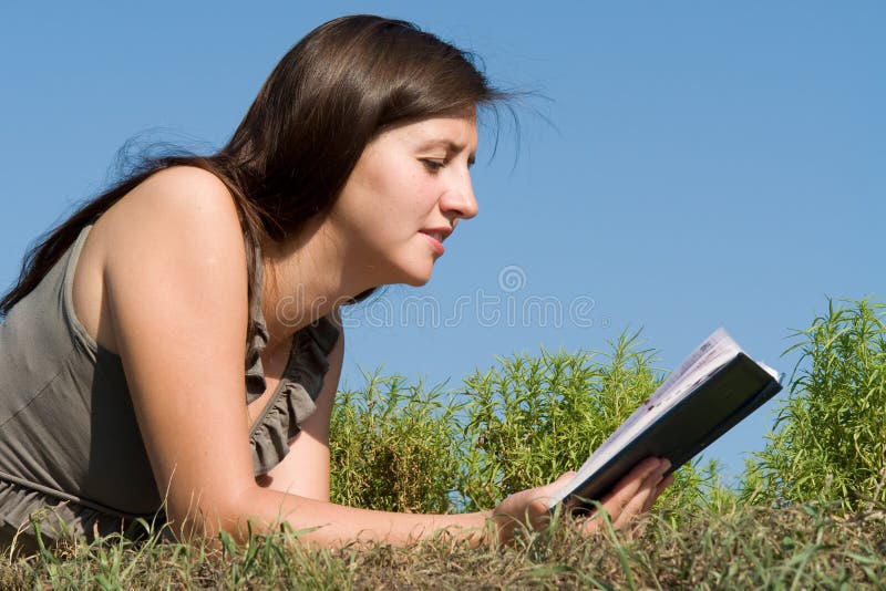 Back View of a Beautiful Teen Girl Reading a Book Stock Photo - Image ...