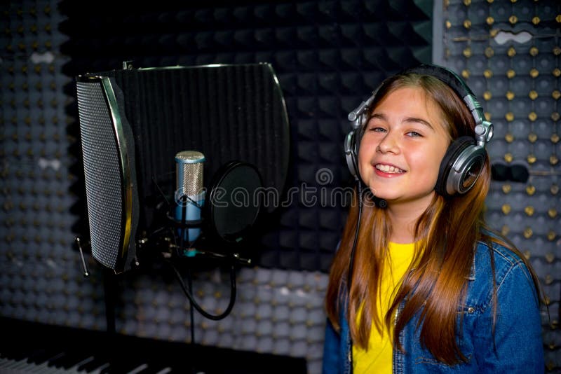 Girl in a recording studio stock image. Image of professional - 107243723