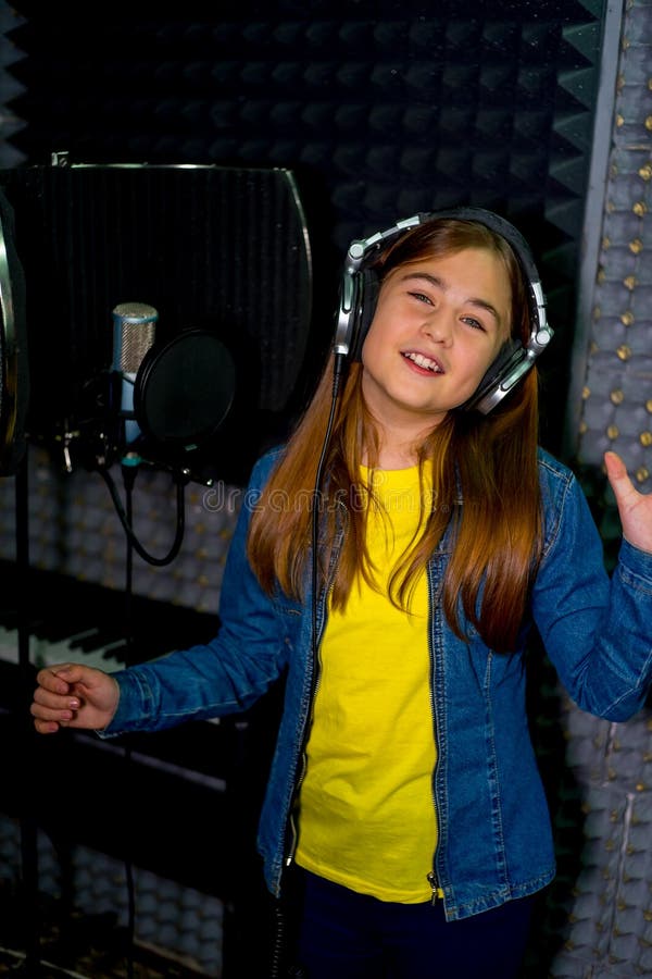 Girl in a recording studio stock image. Image of engineer - 107243851