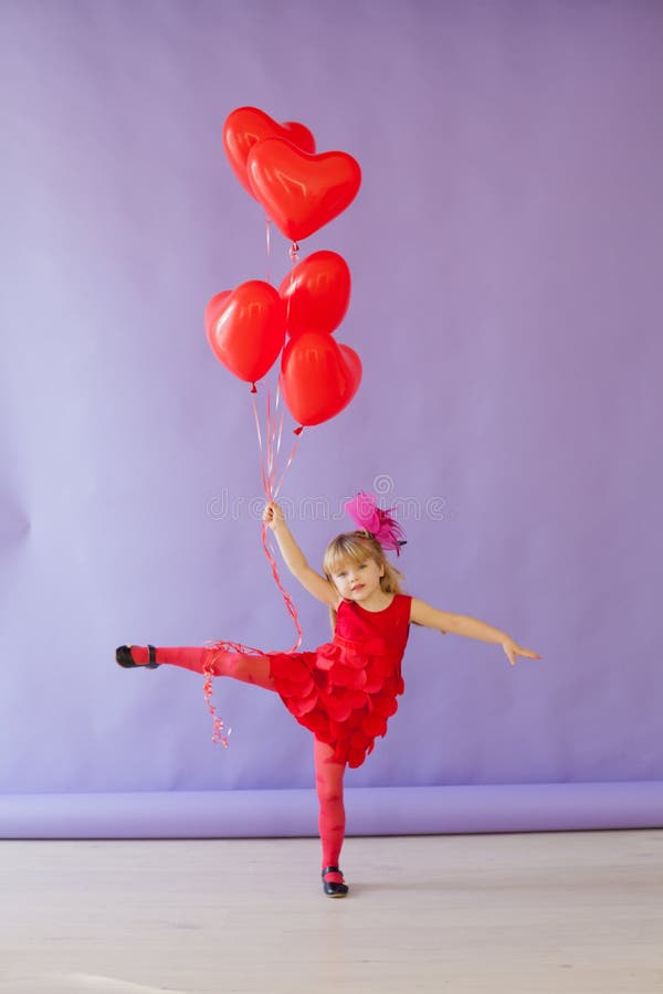 Little Girl with Red Air in the Shape of a Heart Stock Photo - Image of ...
