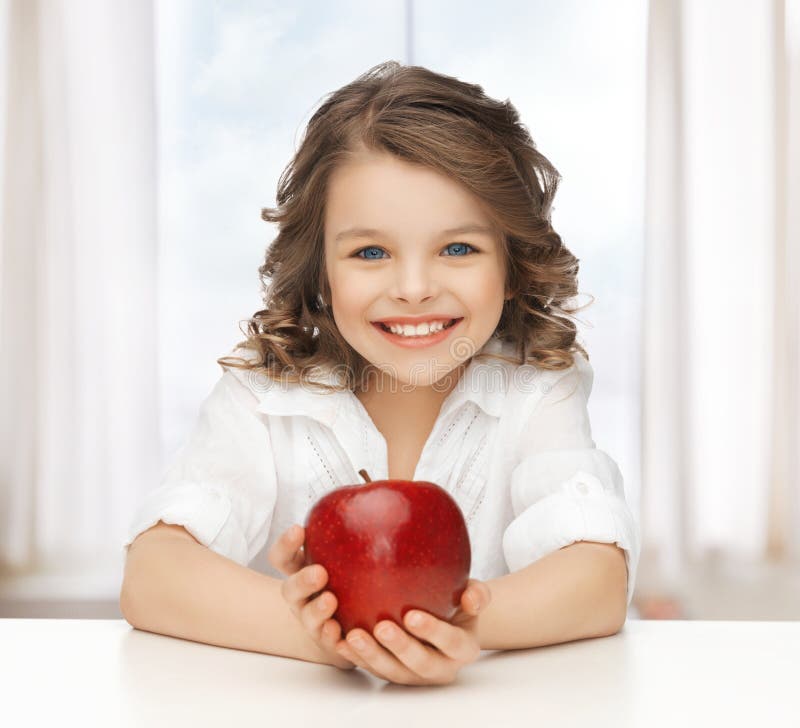 Girl with red apple stock photo. Image of pretty, cool - 38342408