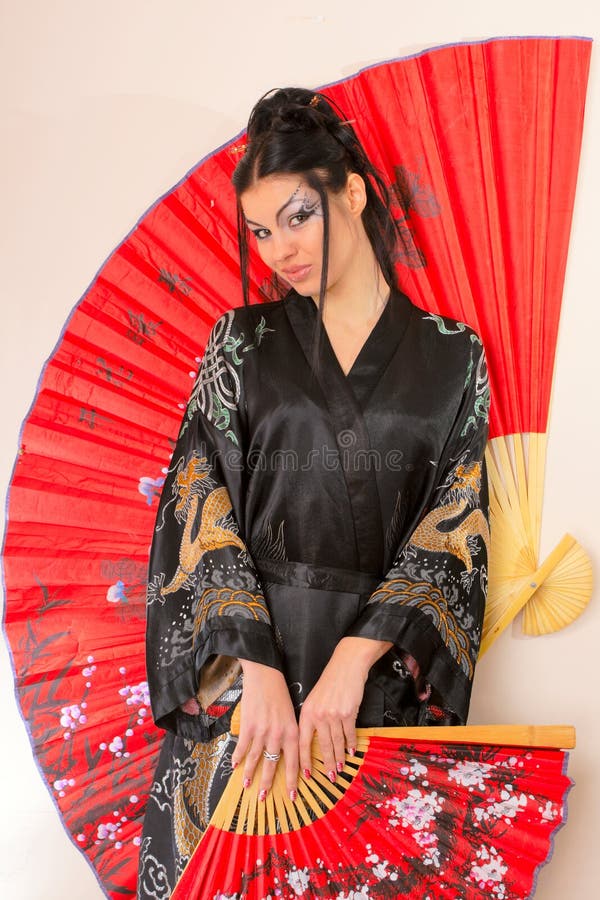 Girl with red asian fan stock image. Image of decoration - 22547979