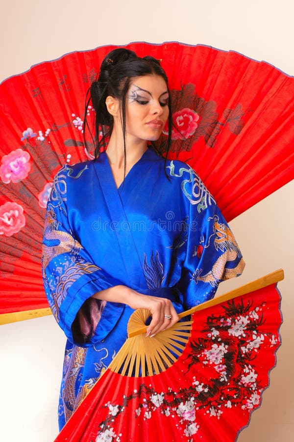 Girl with red asian fan stock photo. Image of clothing - 22548086