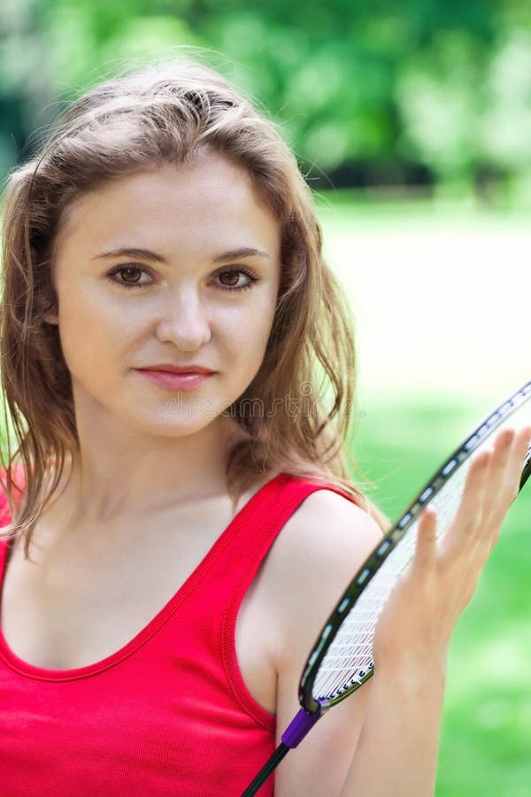 Girl in Red with Badminton Rocket Stock Photo - Image of girl, field ...