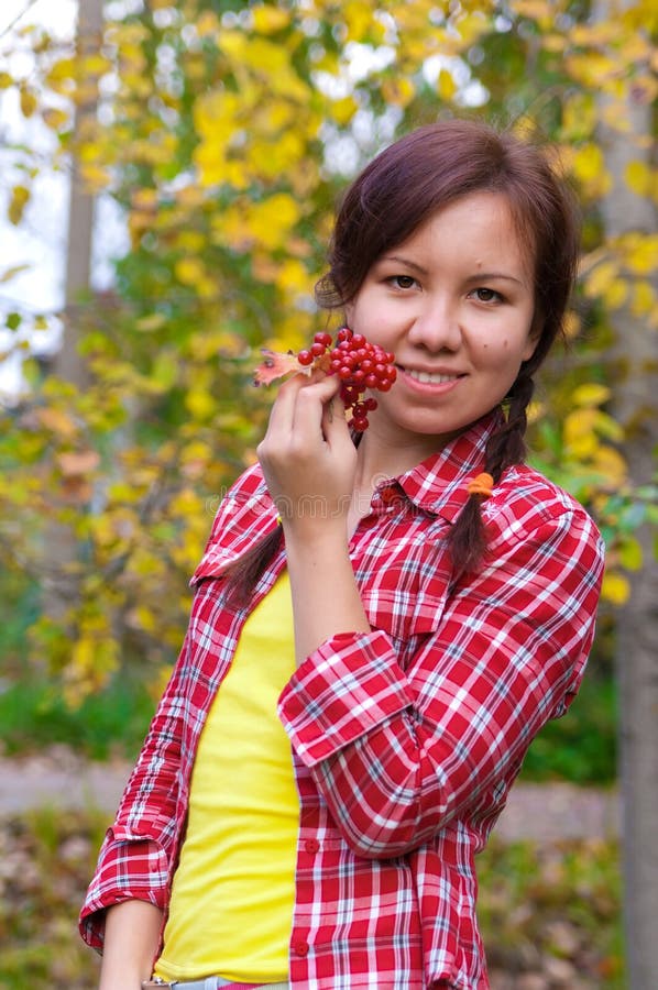 Girl with red berries stock photo. Image of garden, young - 26077474