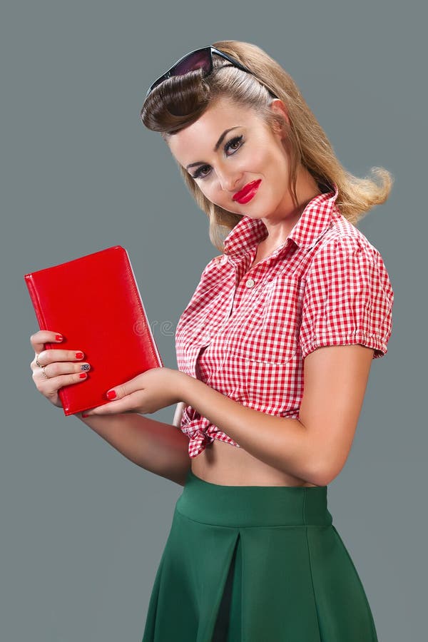 Pin-up Girl at the Picnic Reading a Book on the Background of Forest ...