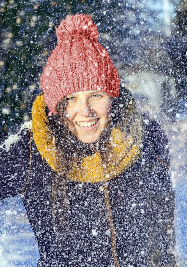 Girl with a Red Cap in a Snow Falling Stock Photo - Image of tooth ...