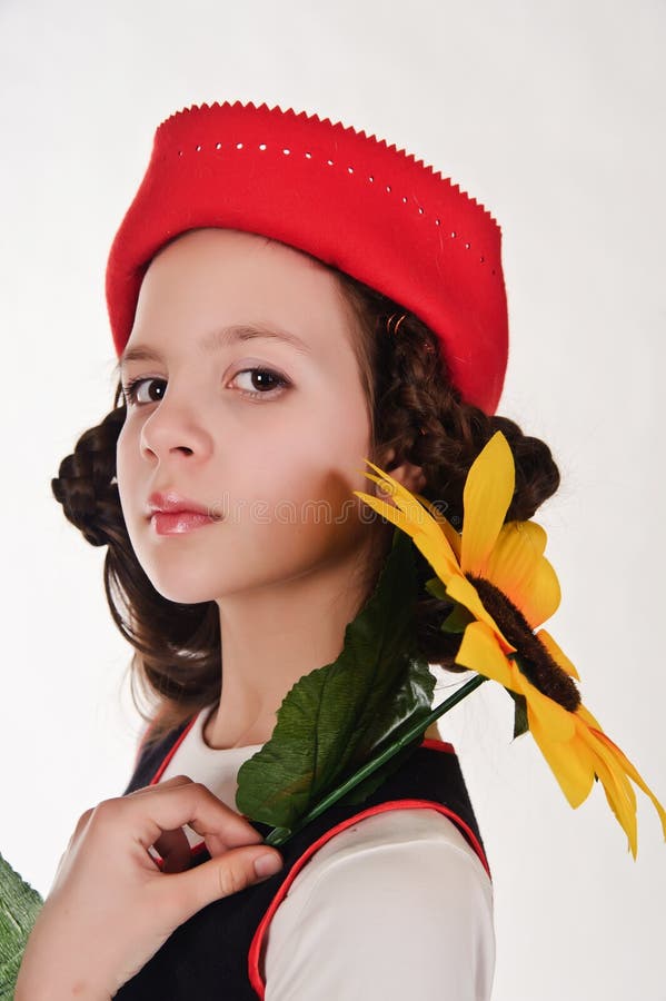 Girl in a Red Cap with a Sunflower Stock Photo - Image of child ...