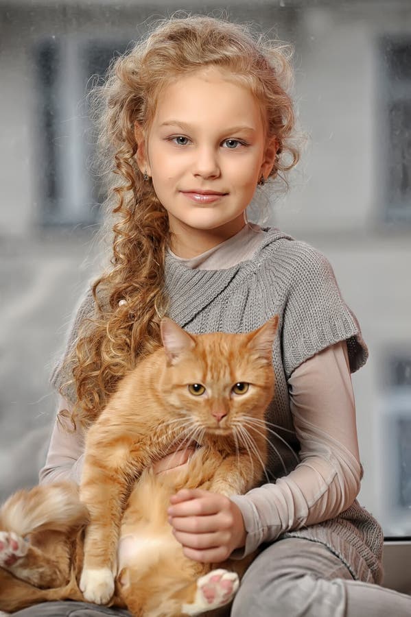 Girl with a red cat stock photo. Image of eyed, curly - 29222726