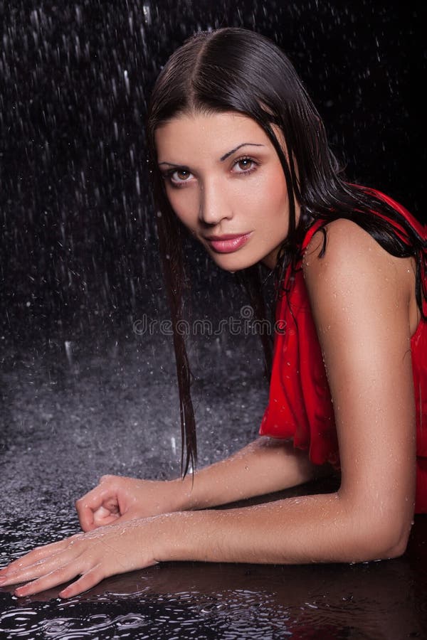 Girl in a Red Dress in the Rain Stock Photo - Image of model, clothes ...
