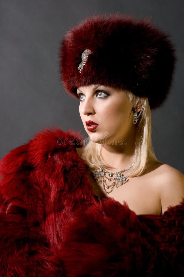 Girl in a red fur cap stock photo. Image of human, face - 7124542