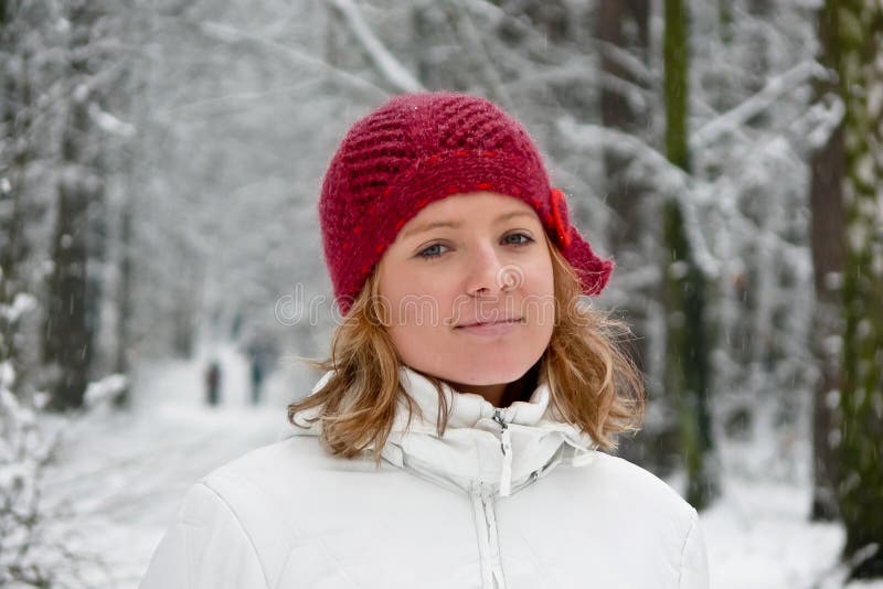 Girl in Red Hat on Snowy Day Stock Image - Image of christmas, trees ...
