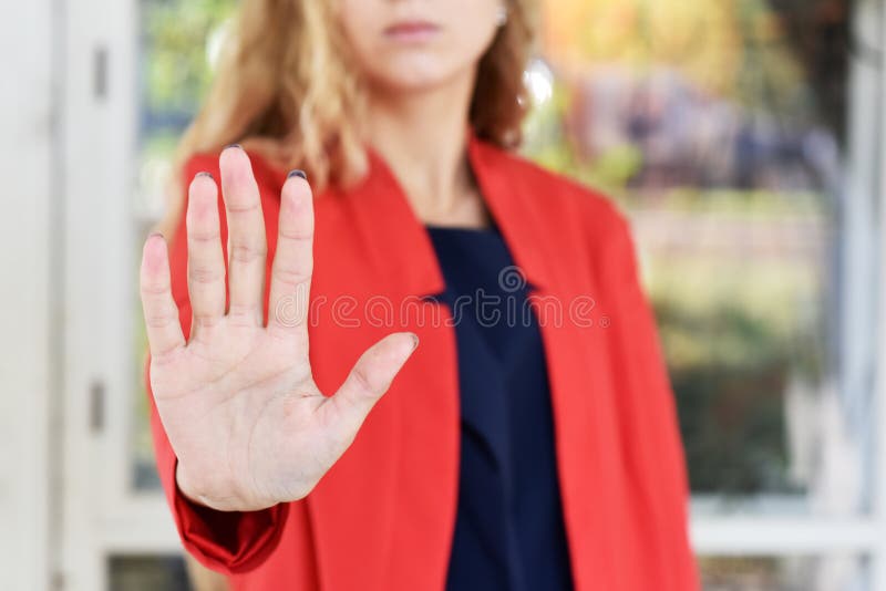 Girl in a Red Jacket Makes Stopping Gesture Open Hand Stock Photo ...