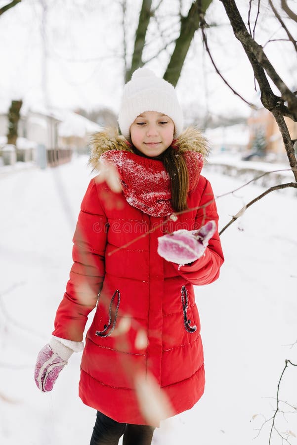 Girl in a Red Jacket in Winter Stock Photo - Image of deep, calm: 86195902