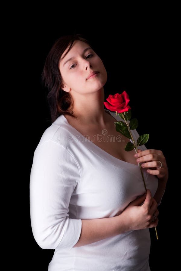 Girl with red rose stock image. Image of woman, petal - 12613539