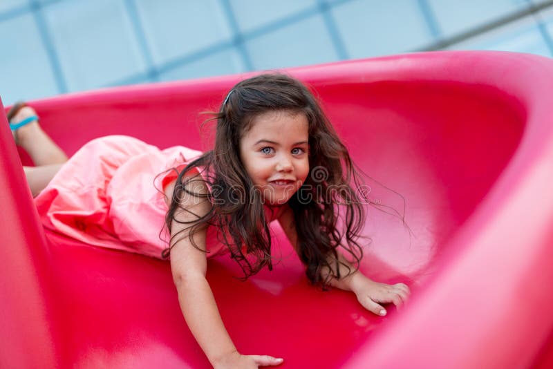 Little Girl Sliding Plastic Chute Stock Photos - Free & Royalty-Free ...
