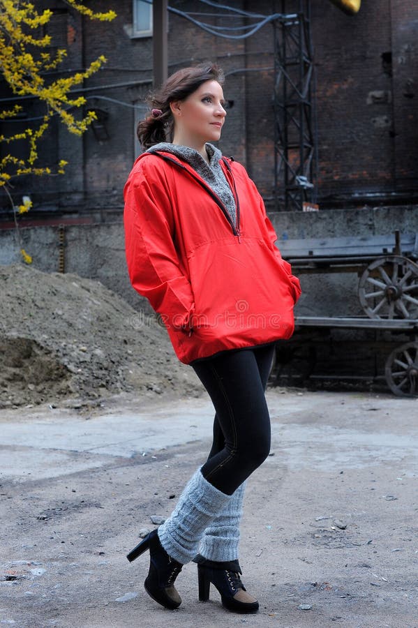 Girl in a red windbreaker stock photo. Image of feminine - 40589572