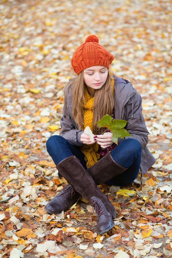 Girl Relaxing in Park on a Fall Day Stock Image - Image of bright, fall ...