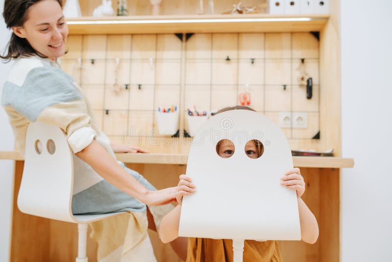 Girl Rests from Classes at the Table, a Short Break for the Games Stock ...