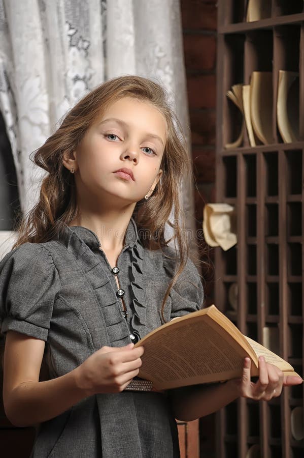 Girl in old library stock image. Image of concentration - 30255725