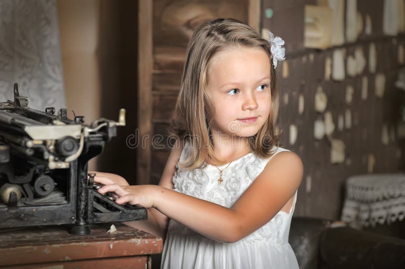 Girl with a Retro Typewriter Stock Photo - Image of print, letters ...