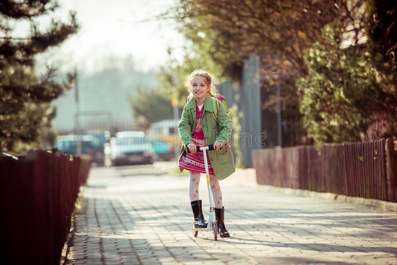 Girl returning from school stock image. Image of morning - 53673349