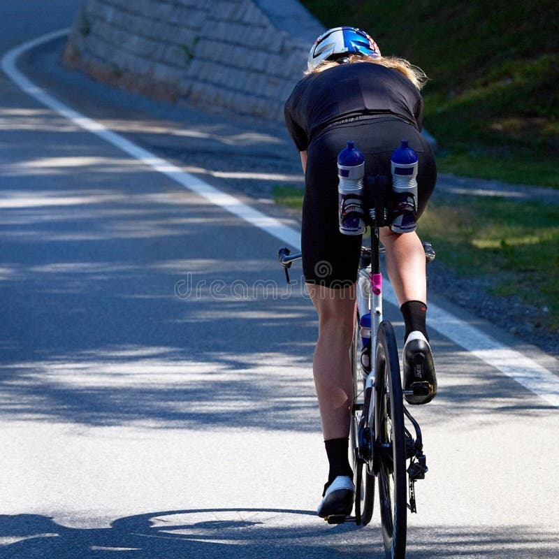 A girl is riding a bicycle editorial photography. Image of sports ...
