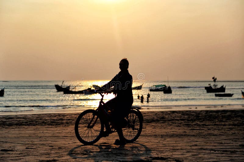 Shadow-of-a-girl-riding-bicycle Picture. Image: 87858136