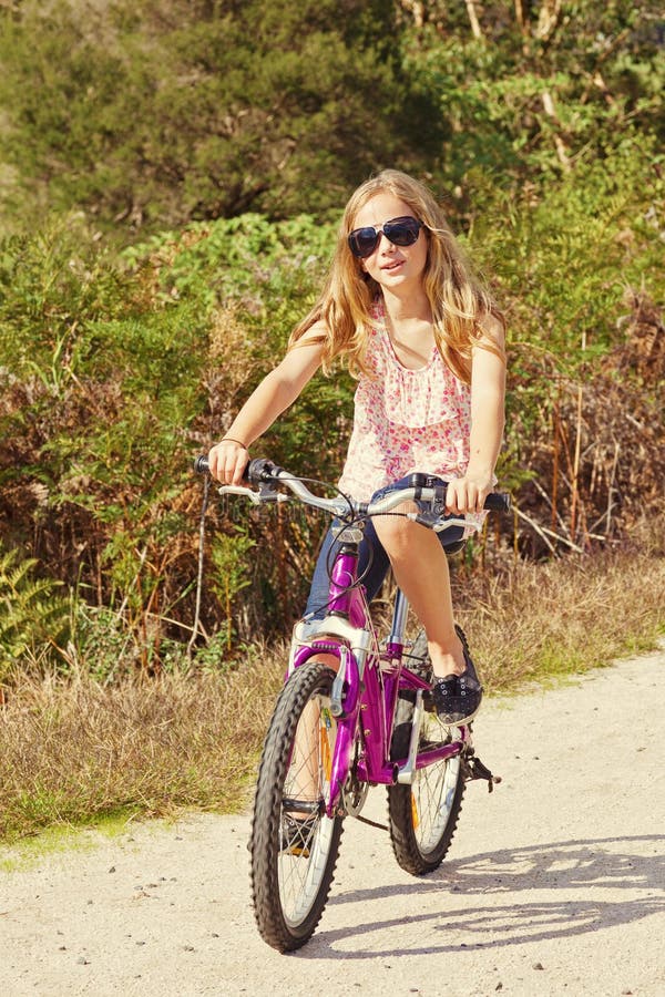 Girl riding bike stock photo. Image of summer, bike, active - 30516644