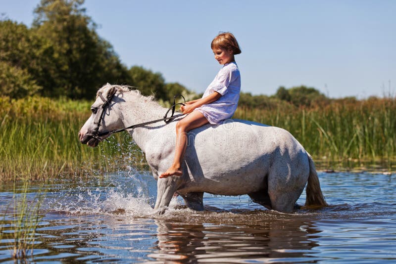 Girl Riding a Horse in a River Stock Image - Image of nature, children ...