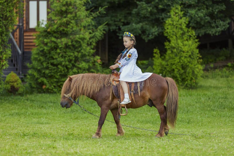 Girl riding a pony stock illustration. Illustration of cartoon - 280381360