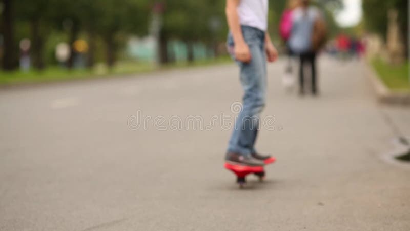 Girl Riding a Skateboard on Two Wheels on the Stock Video - Video of ...