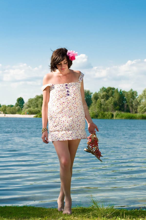 Girl on river bank stock photo. Image of sunny, smiling - 13473034