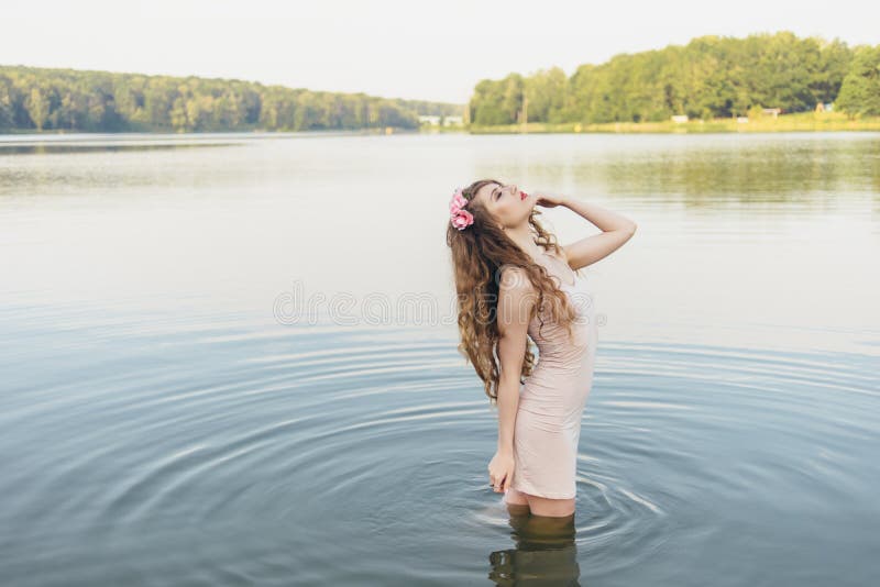 Girl in river stock photo. Image of pond, person, sunset - 92201520