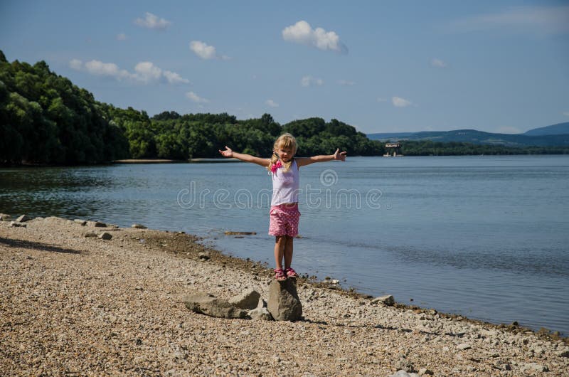 Girl by the river stock photo. Image of blond, summer - 60492628