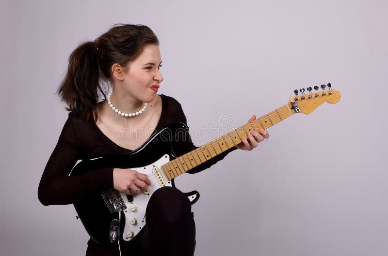 Girl Rock stock image. Image of virtuoso, teen, guitarist - 910099
