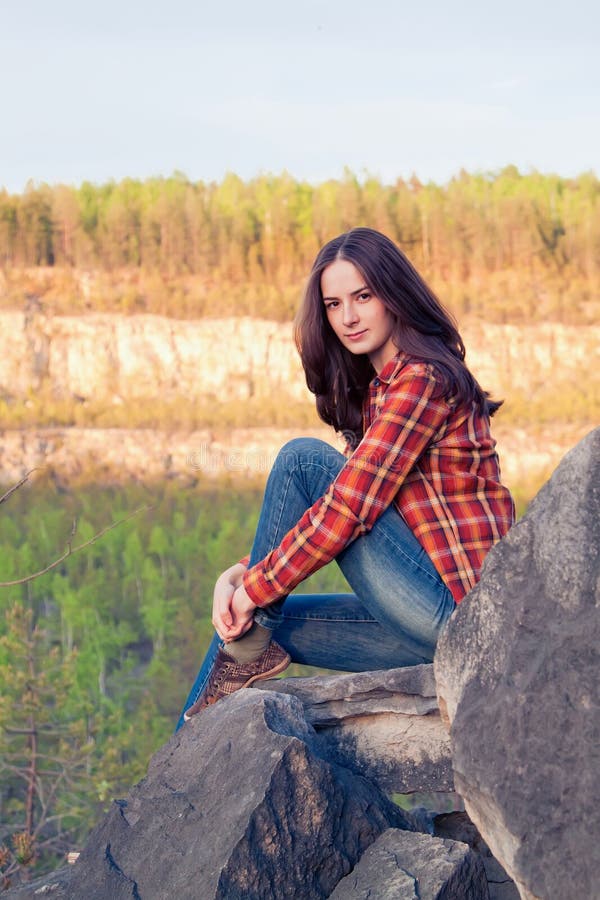 Girl on the rocks stock photo. Image of cliff, natural - 31664998