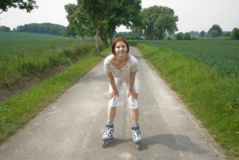 The girl on rollers, stock photo. Image of mood, figure - 9801474