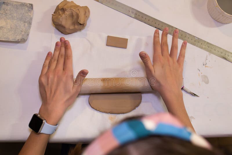 Girl Rolls the Clay in the Studio Stock Photo - Image of ceramic, skill ...