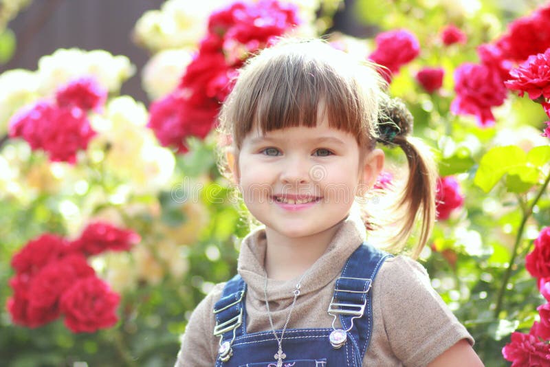 The girl in roses stock photo. Image of color, park, beautiful - 51344106