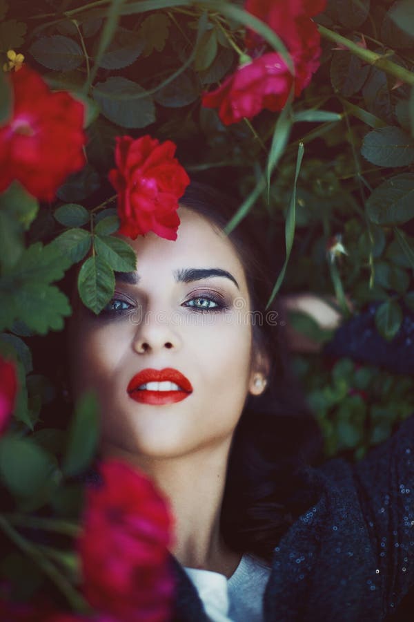 Girl with roses stock photo. Image of forest, green, roses - 49697174