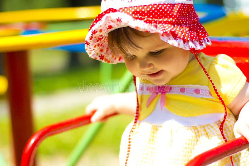 Girl on roundabout. stock image. Image of sitting, childhood - 31979171