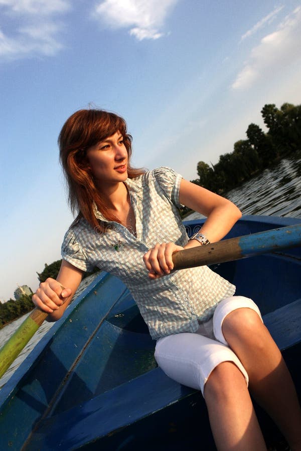 Girl rowing boat stock image. Image of fitness, friend - 6099465