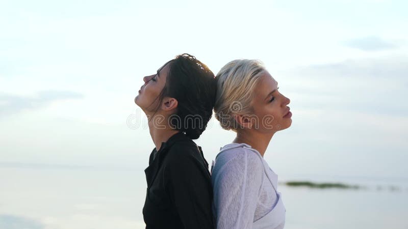 Girl rubs back to back stock footage. Video of cramp - 160714732