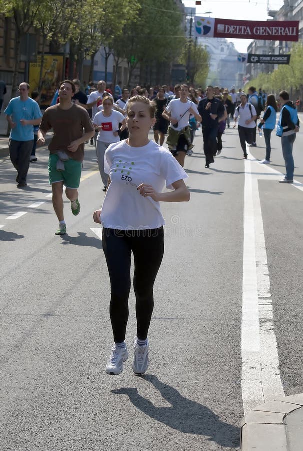 Fun Run runner in action editorial photo. Image of athletics - 13923806