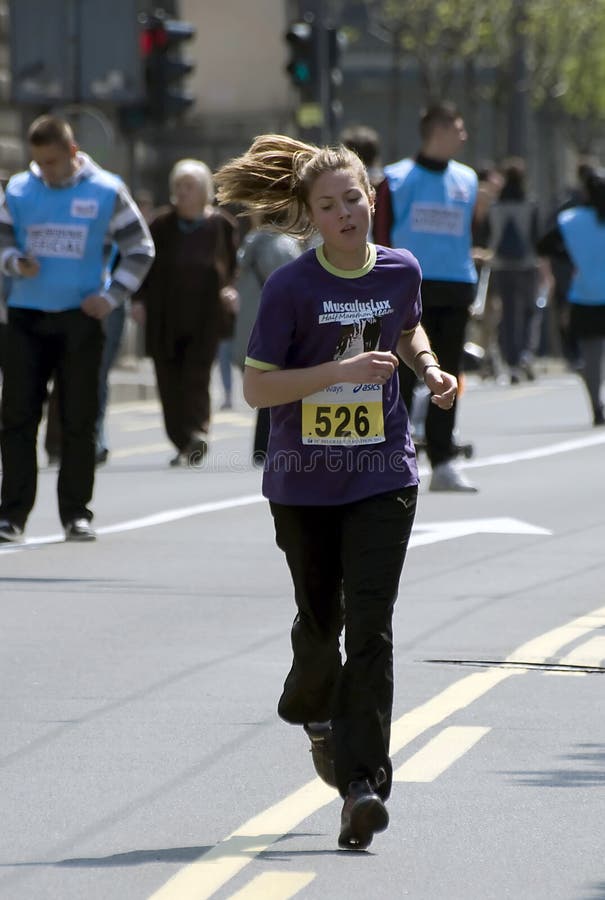 Girl Runner Near the Finish Line Editorial Photography - Image of ...
