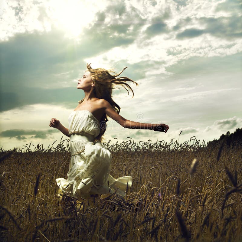 Girl running across field stock image. Image of carefree - 15800991