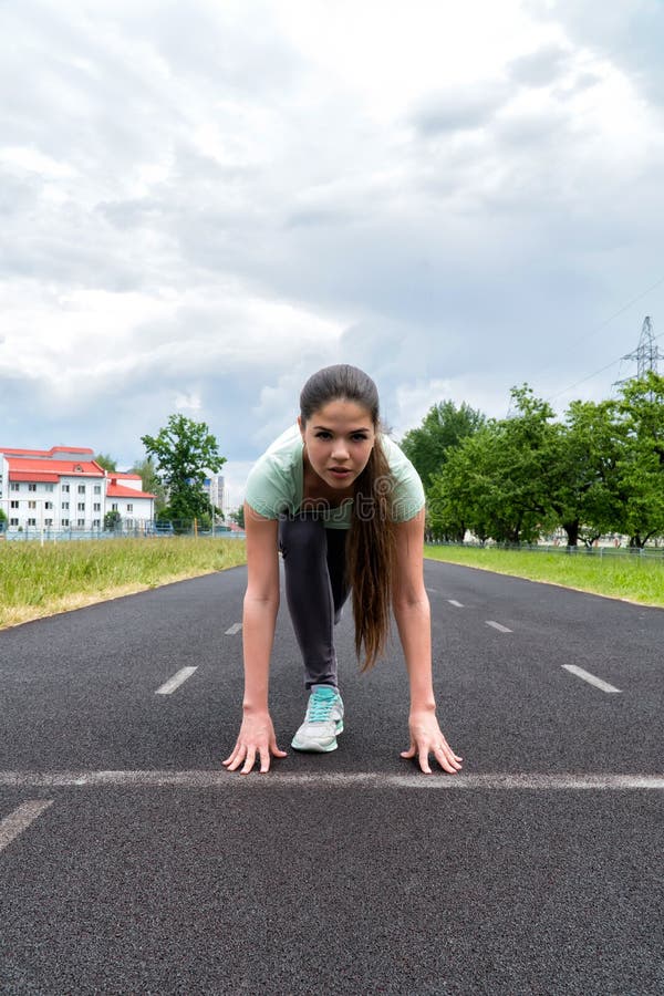 The Man is Running Around the Stadium. Training Outdoors Stock Photo ...