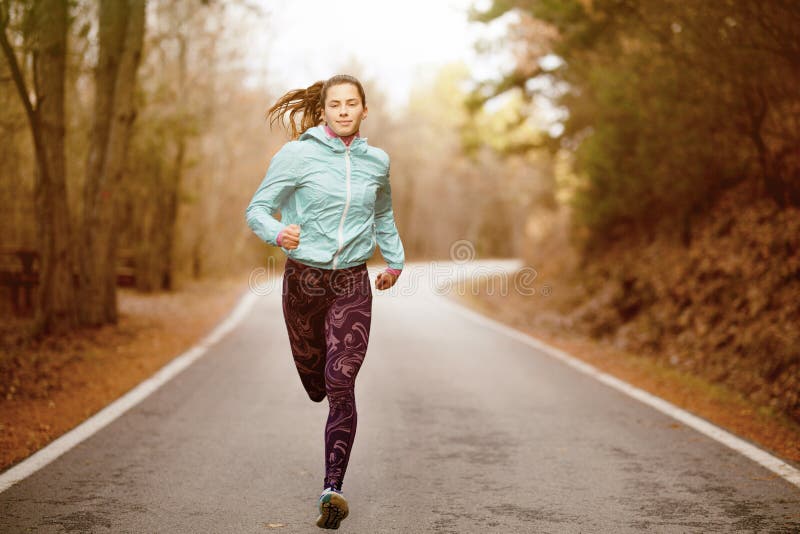 Two Girls Running Outside on a Concrete Pathway. Motion Blur Photo ...