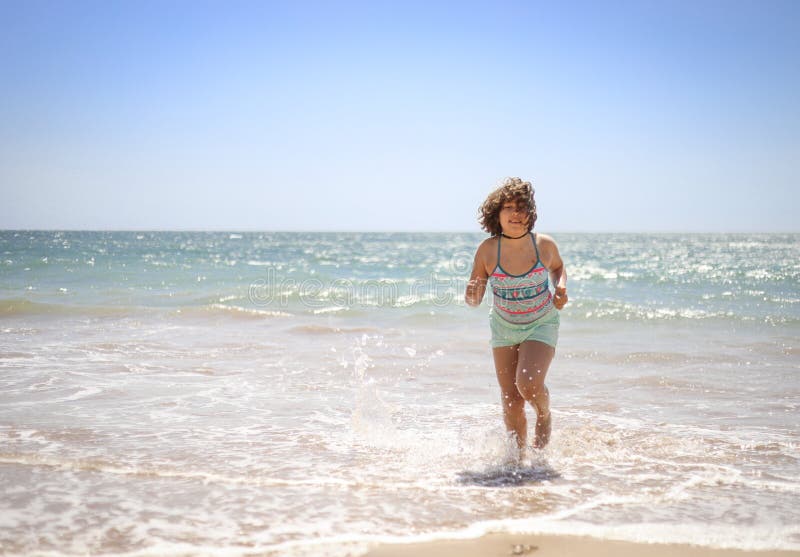 Summer fun on the beach. stock image. Image of exercise - 217098443